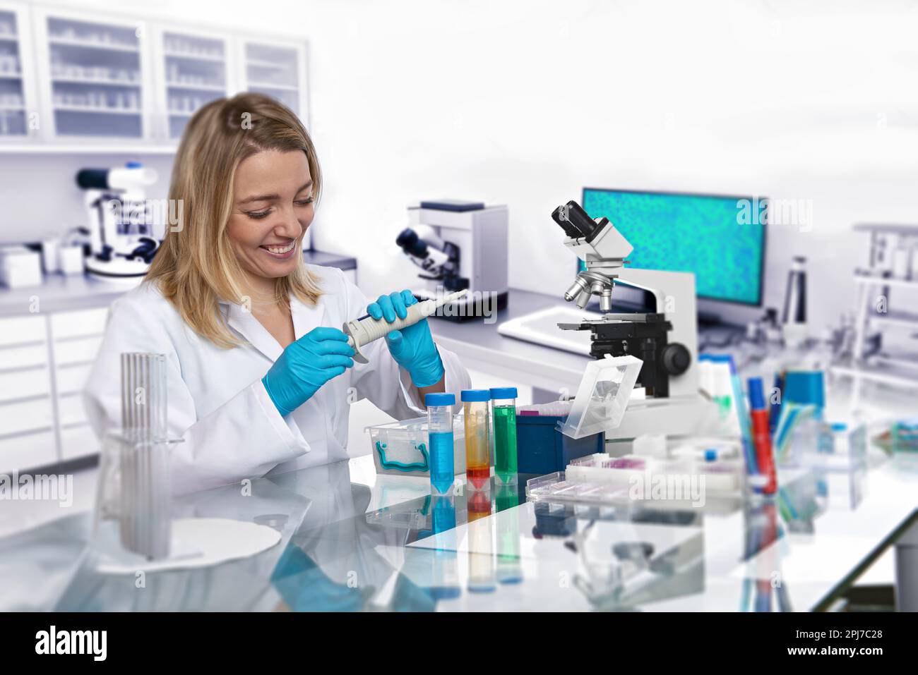 Energetic Caucasian female scientist working in scientific research ...