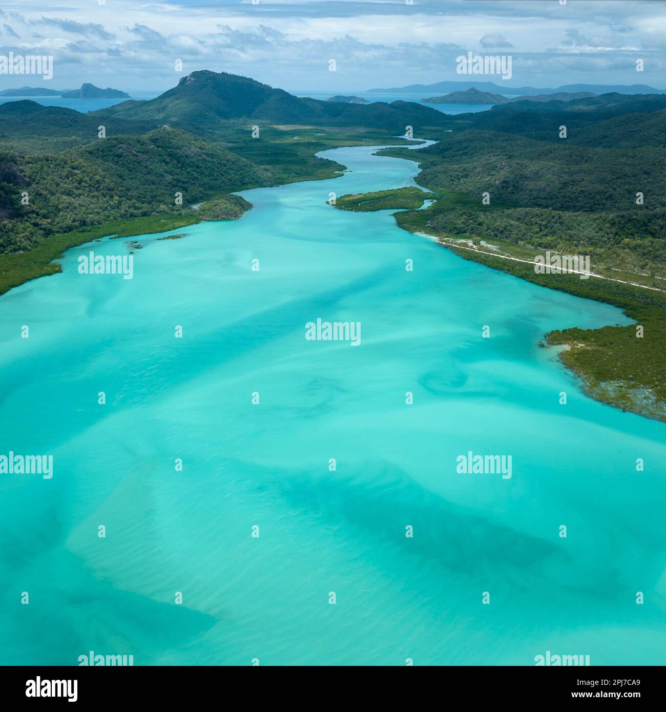 Aerial view of an inlet waterway next to Whitehaven Beach, Queensland ...