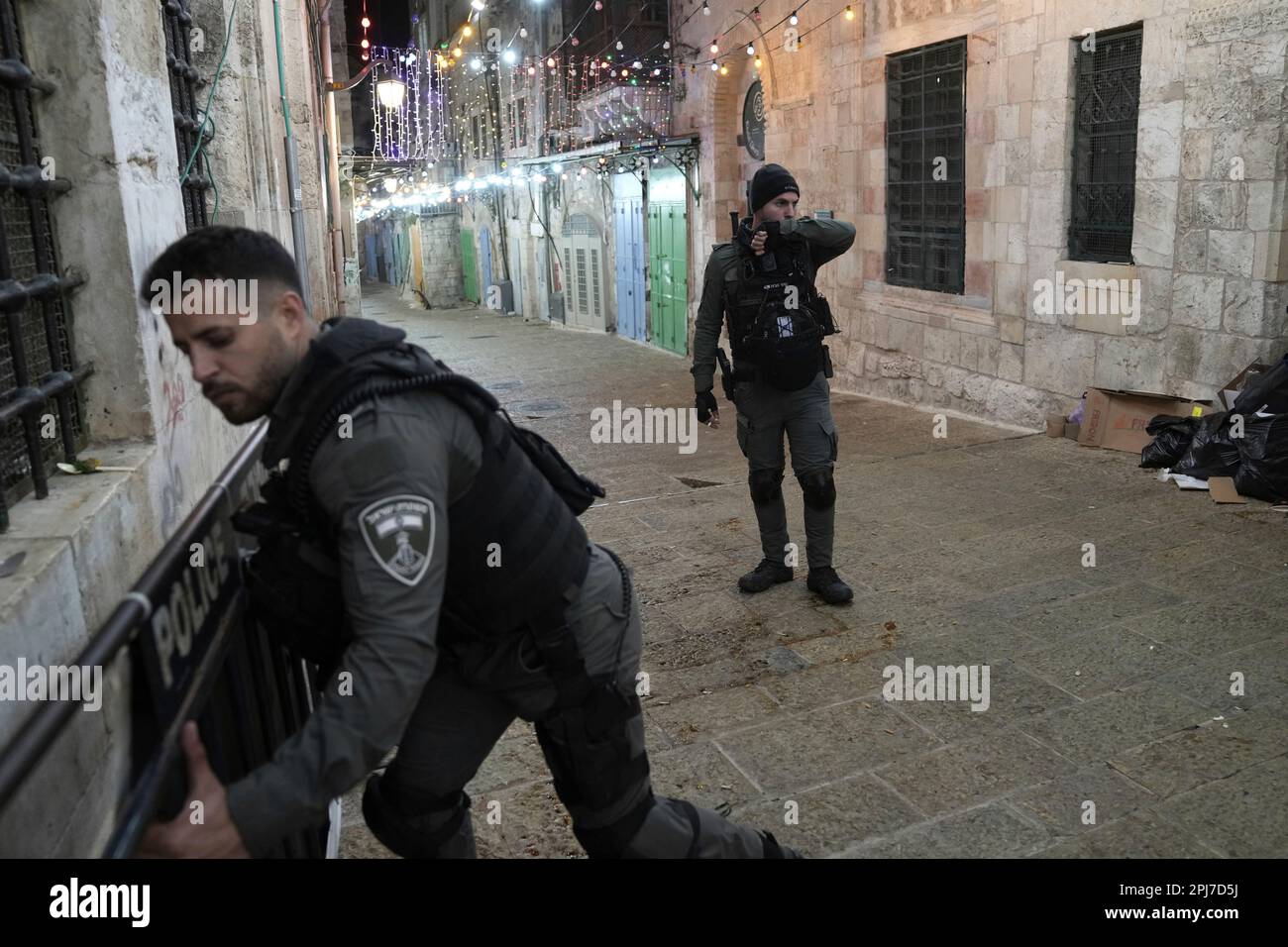 Israeli paramilitary Border Police close a path leading to the Al-Aqsa ...