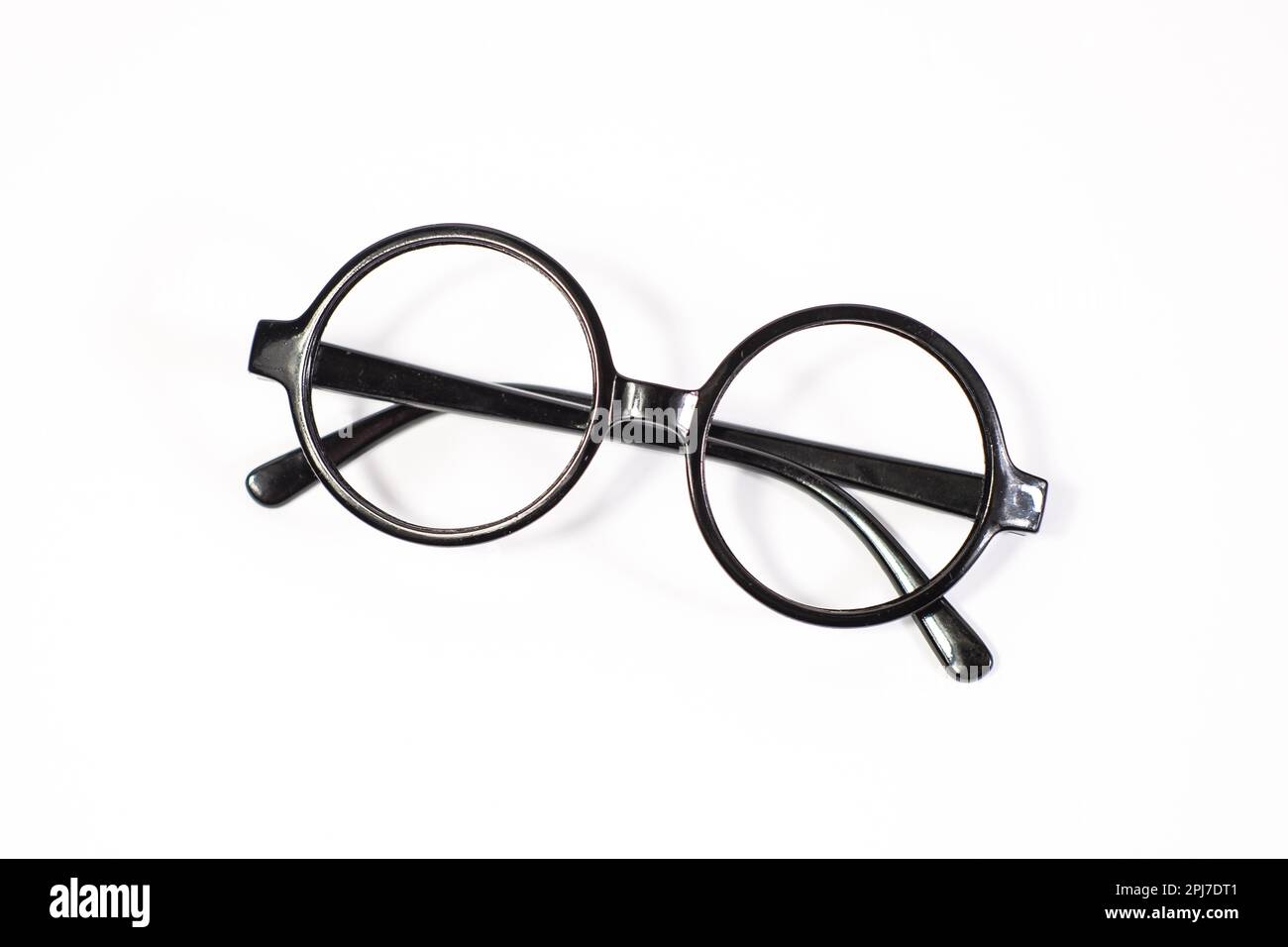 Round black eyeglasses isolated on white background Stock Photo - Alamy
