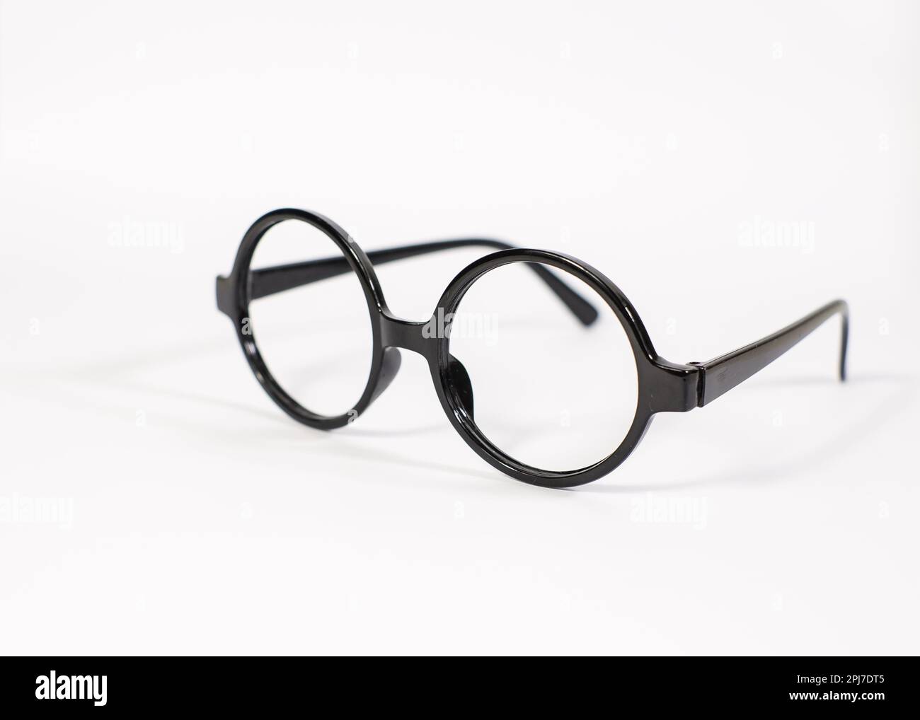 Round black eyeglasses isolated on white background Stock Photo - Alamy