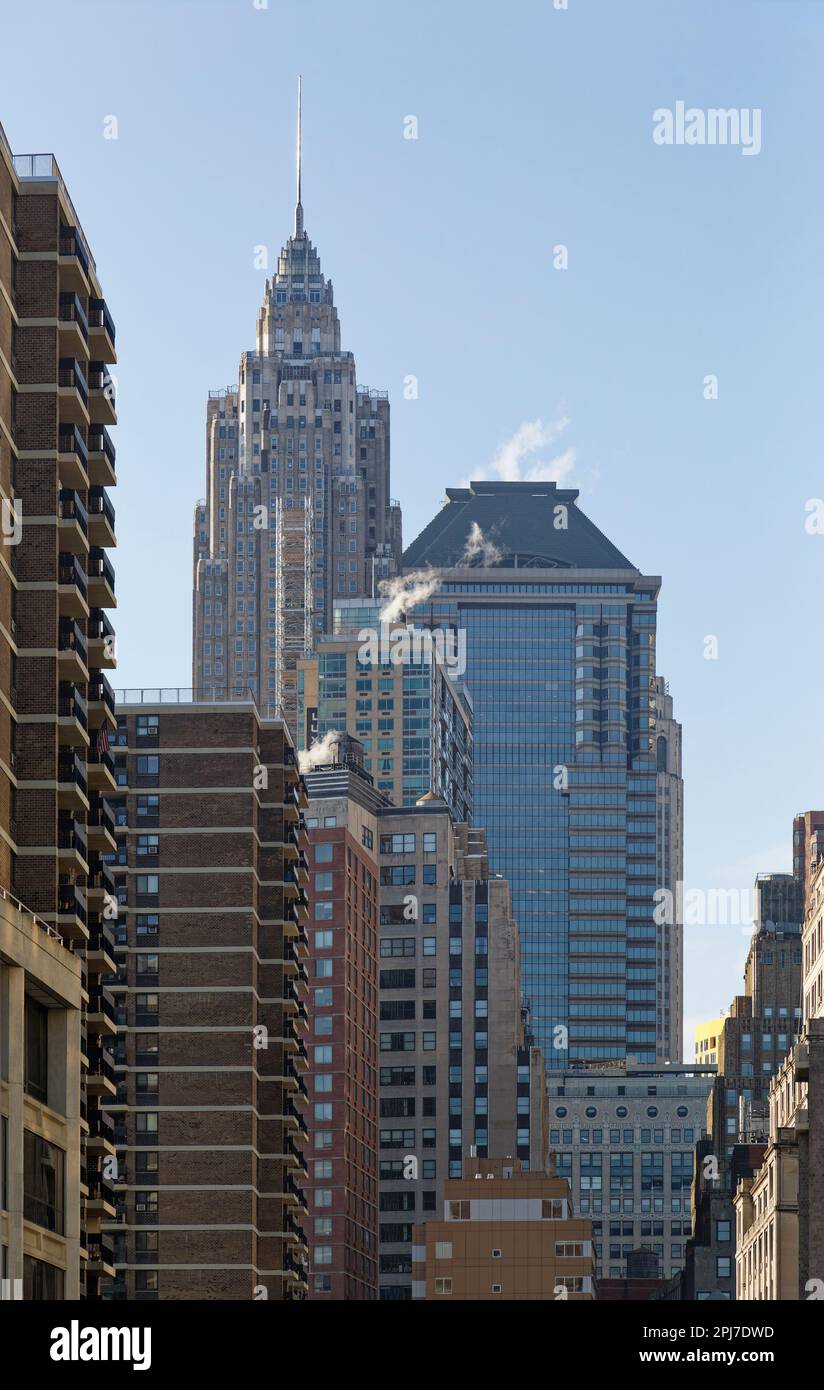 Heavy masonry of needle-tipped 70 Pine Street towers over the blue ...