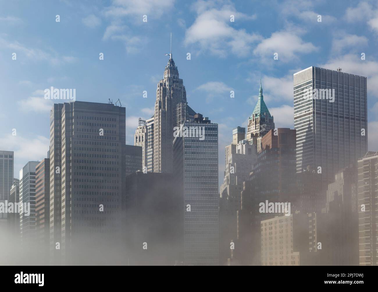 Needle-tipped 70 Pine Street and verdigris pyramid-capped 40 Wall ...
