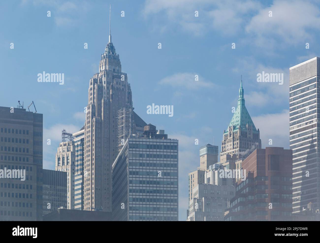 Needle-tipped 70 Pine Street and verdigris pyramid-capped 40 Wall ...