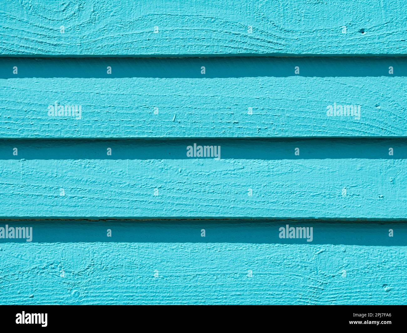 Simple pale blue painted wood grain boards for simple back drop to add ...