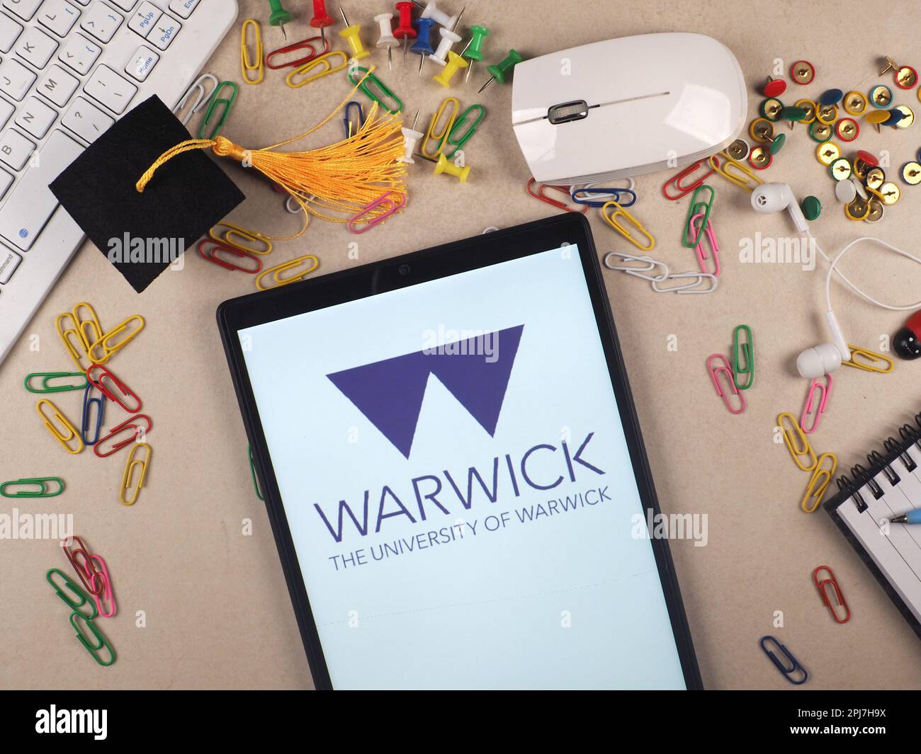 In this photo illustration, The University of Warwick logo seen ...