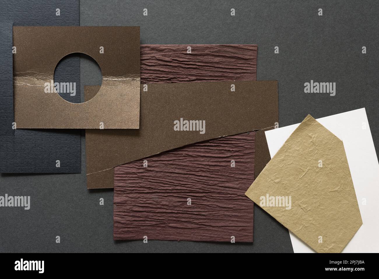 eclectic paper shapes on grey background Stock Photo - Alamy