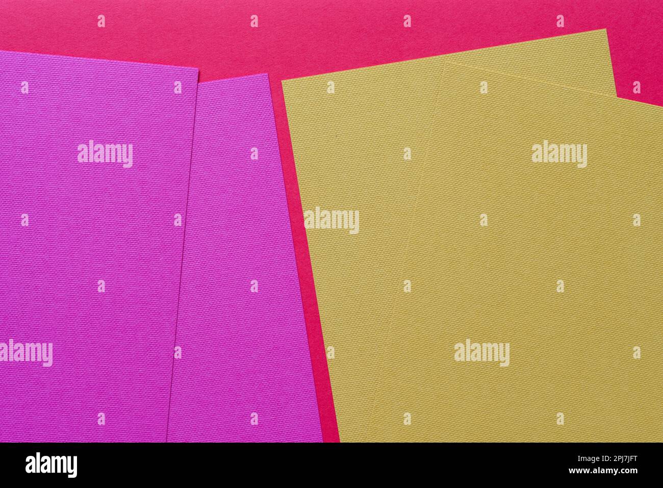 magenta and mustard yellow card stock on hot pink background Stock ...