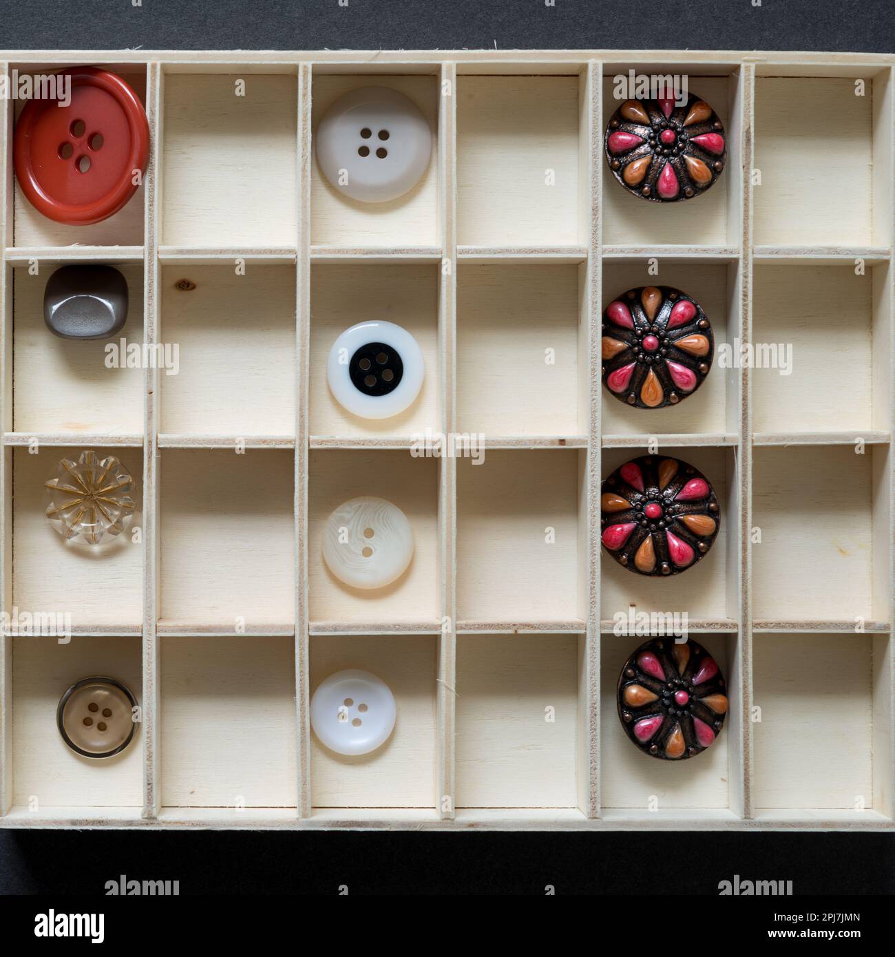 wooden box with fancy buttons Stock Photo - Alamy