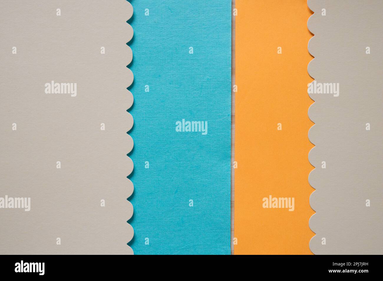 beige cards with decorative borders on blue and orange paper Stock ...