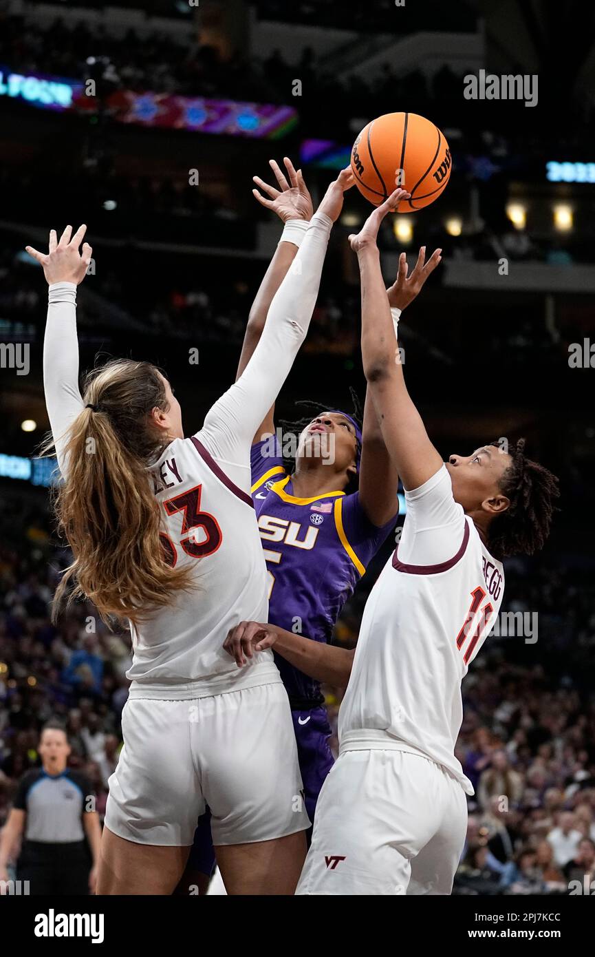 Virginia Tech's Elizabeth Kitley and D'asia Gregg block a shot by LSU's ...