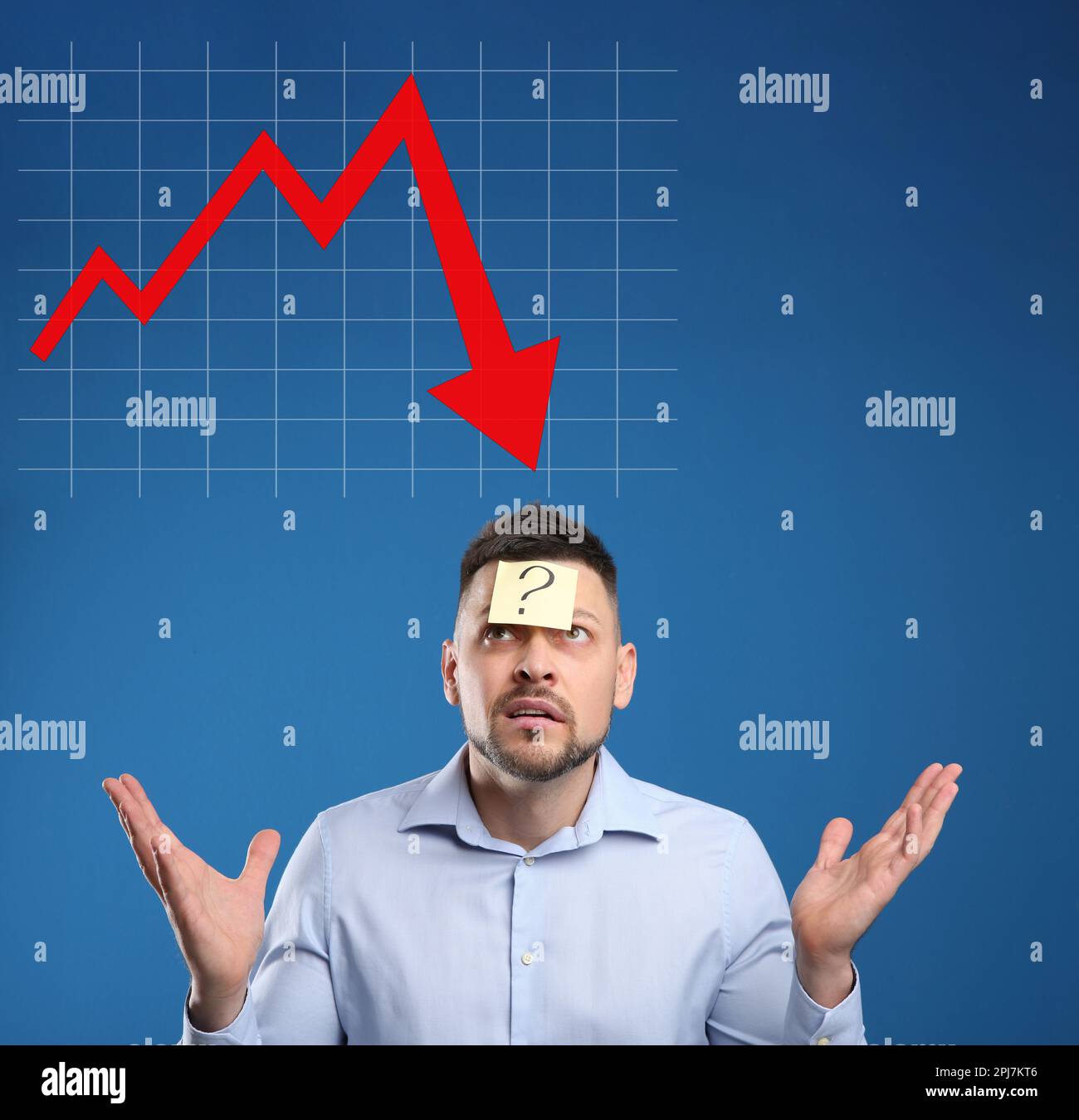 Man with question mark and illustration of falling down chart on light ...