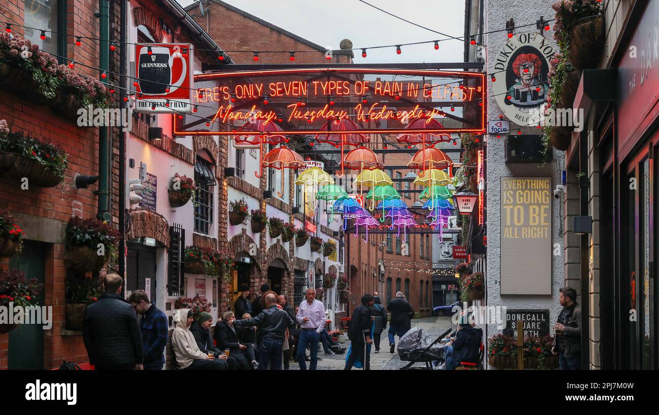 Social life Belfast wet spring day, crowd outside popular Belfast ...