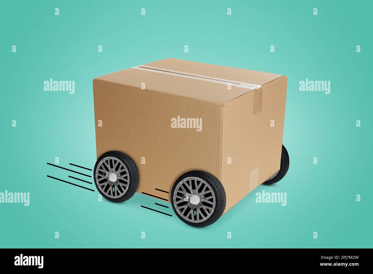 Cardboard box on wheels against turquoise background. Order hurrying to ...