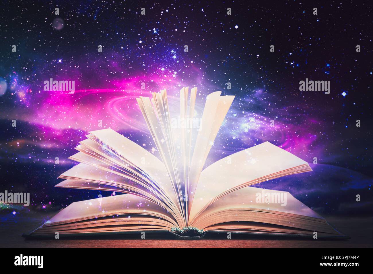 Open book with glitter overlay and beautiful universe on background ...