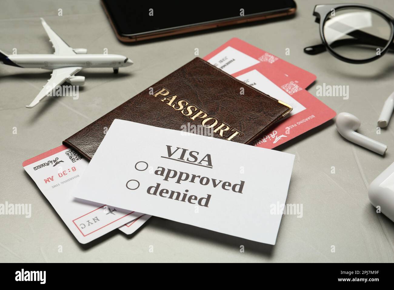 Passport and tickets on grey table, closeup. Visa receiving Stock Photo ...