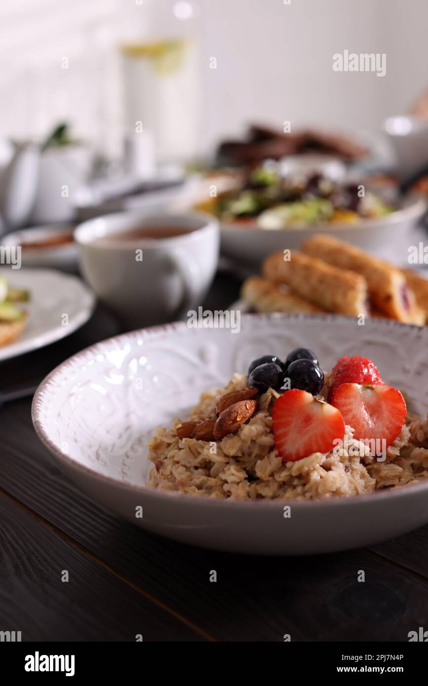 Oatmeal with fruits and nuts served on buffet table for brunch Stock ...