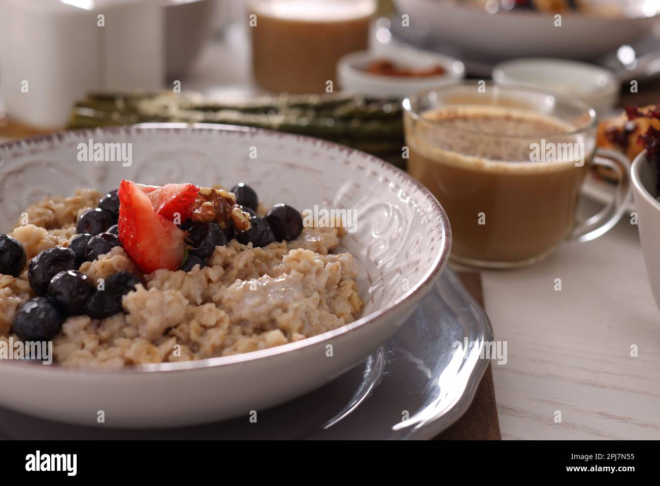 Oatmeal with fruits and nuts served on buffet table for brunch Stock ...