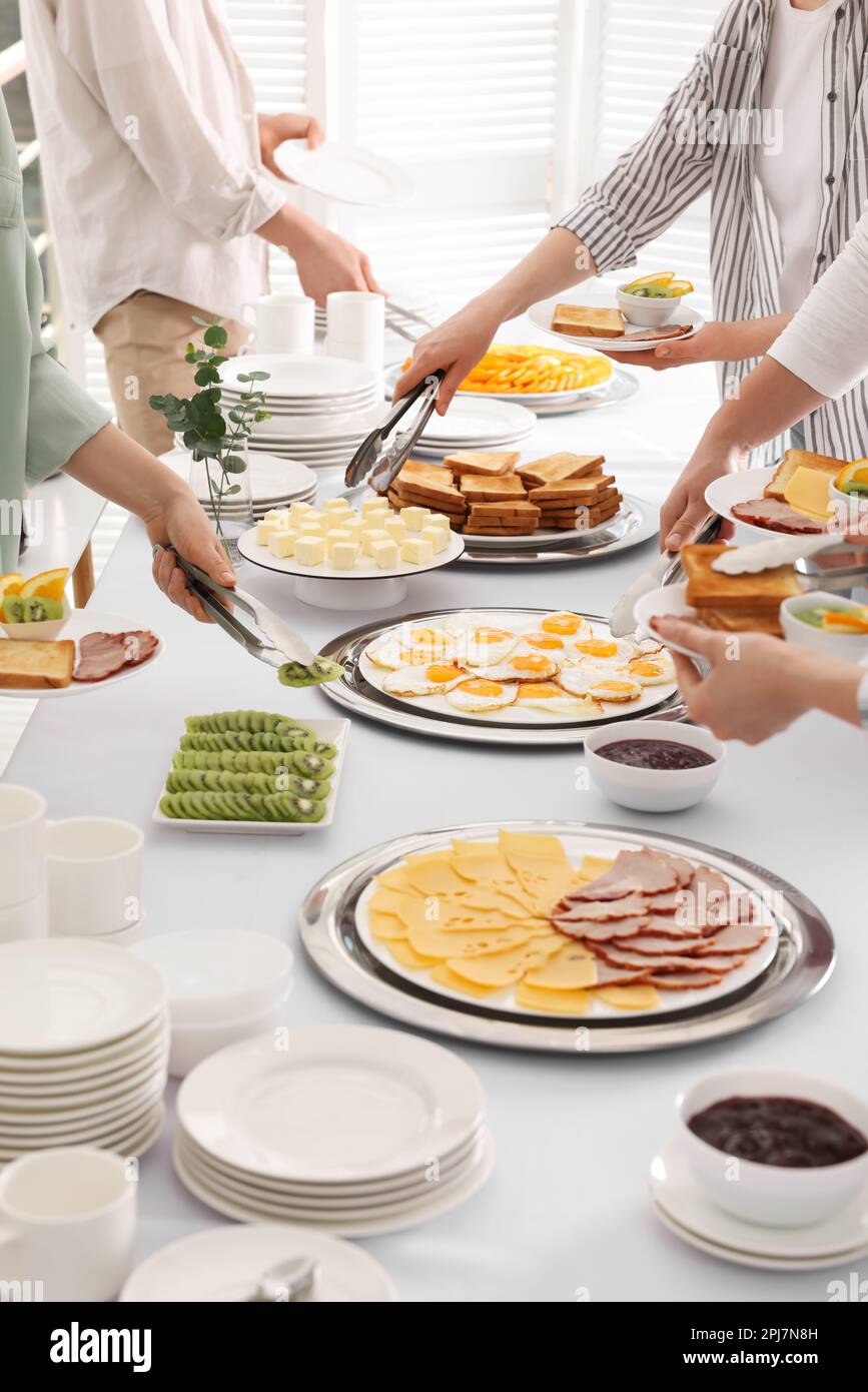 People taking food during breakfast, closeup. Buffet service Stock ...