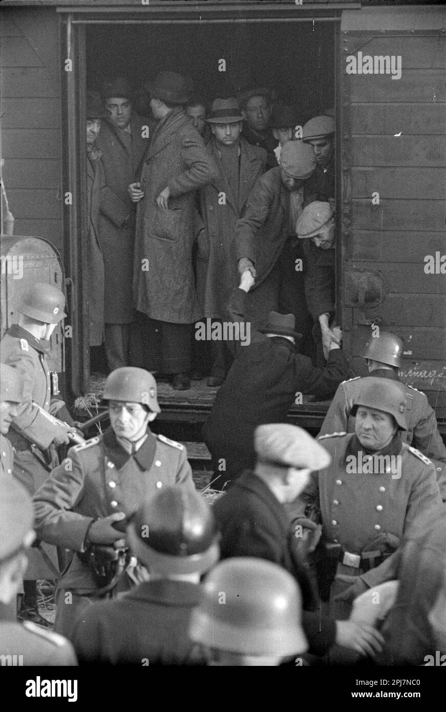 Jews being loaded onto a train at Marseilles in France during WW2. The ...