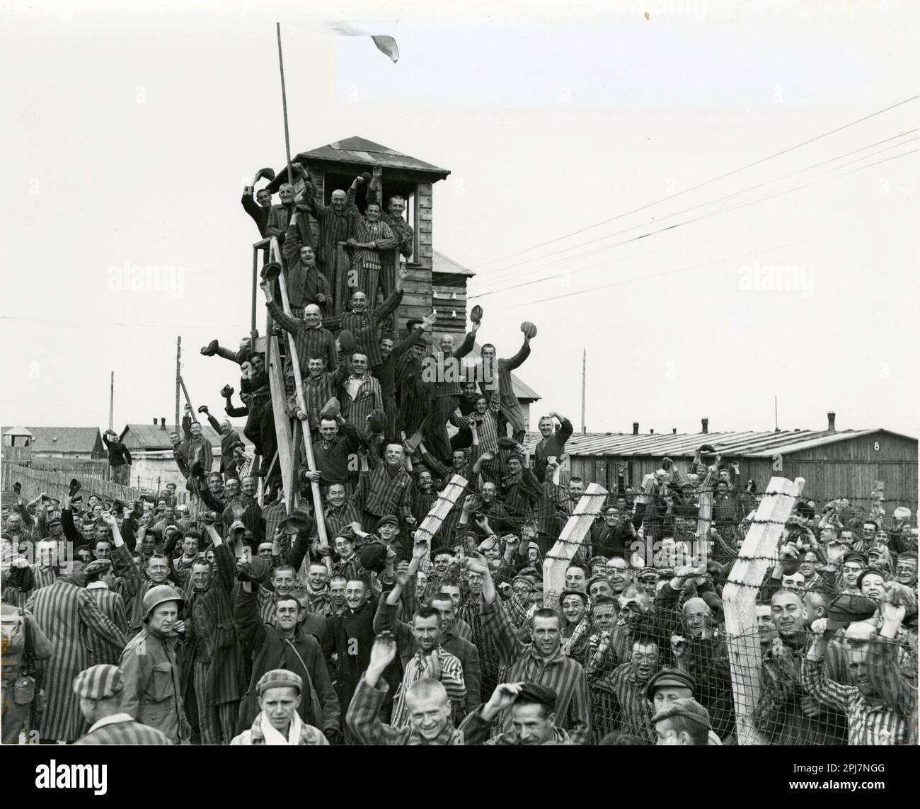 Newly liberated prisoners of the Allach concentration camp celebrate ...