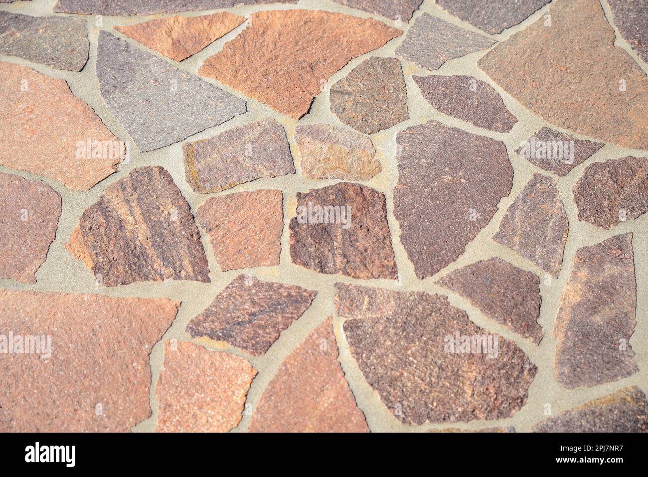 Beautiful pavement with stone fragments as background, top view Stock ...