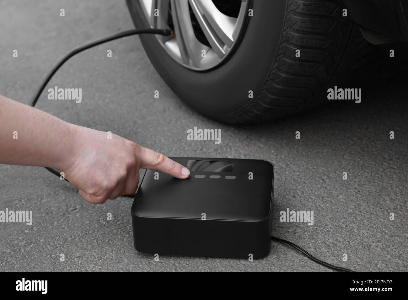 Man using air pump hi-res stock photography and images - Alamy