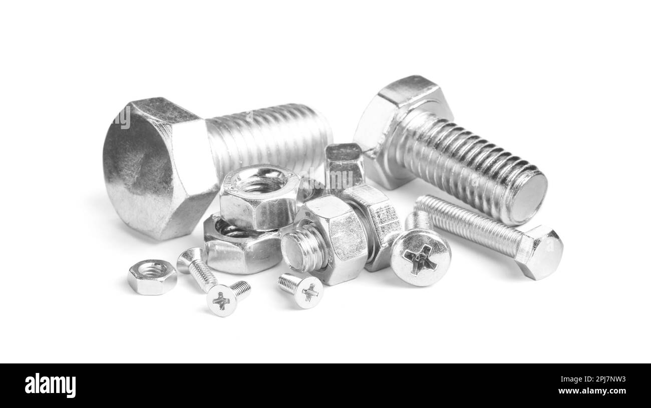 Different metal bolts and nuts on white background Stock Photo - Alamy