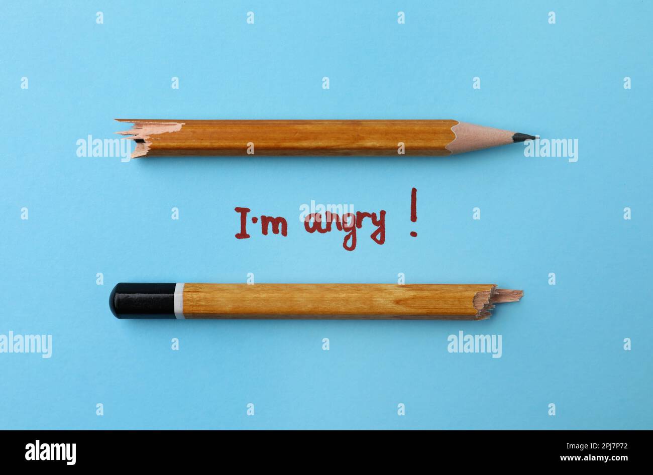 Broken pencil and inscription I'm Angry! on light blue background, flat ...