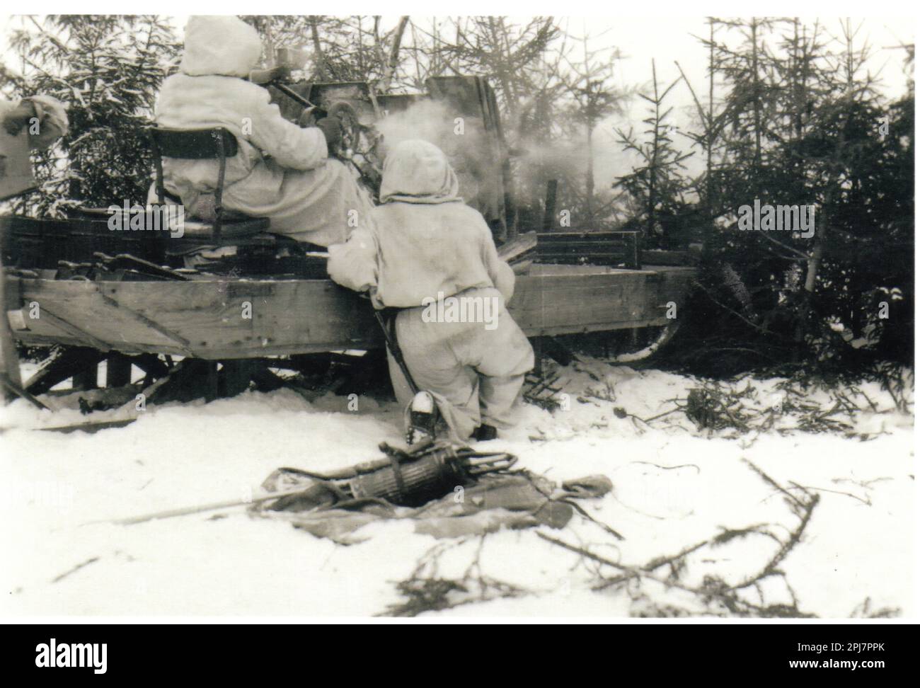 World War Two B&W photo German Soldiers in Winter Snow Parkas Fire a ...