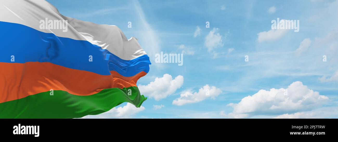 flag of Dravidian peoples Telugus at cloudy sky background, panoramic ...
