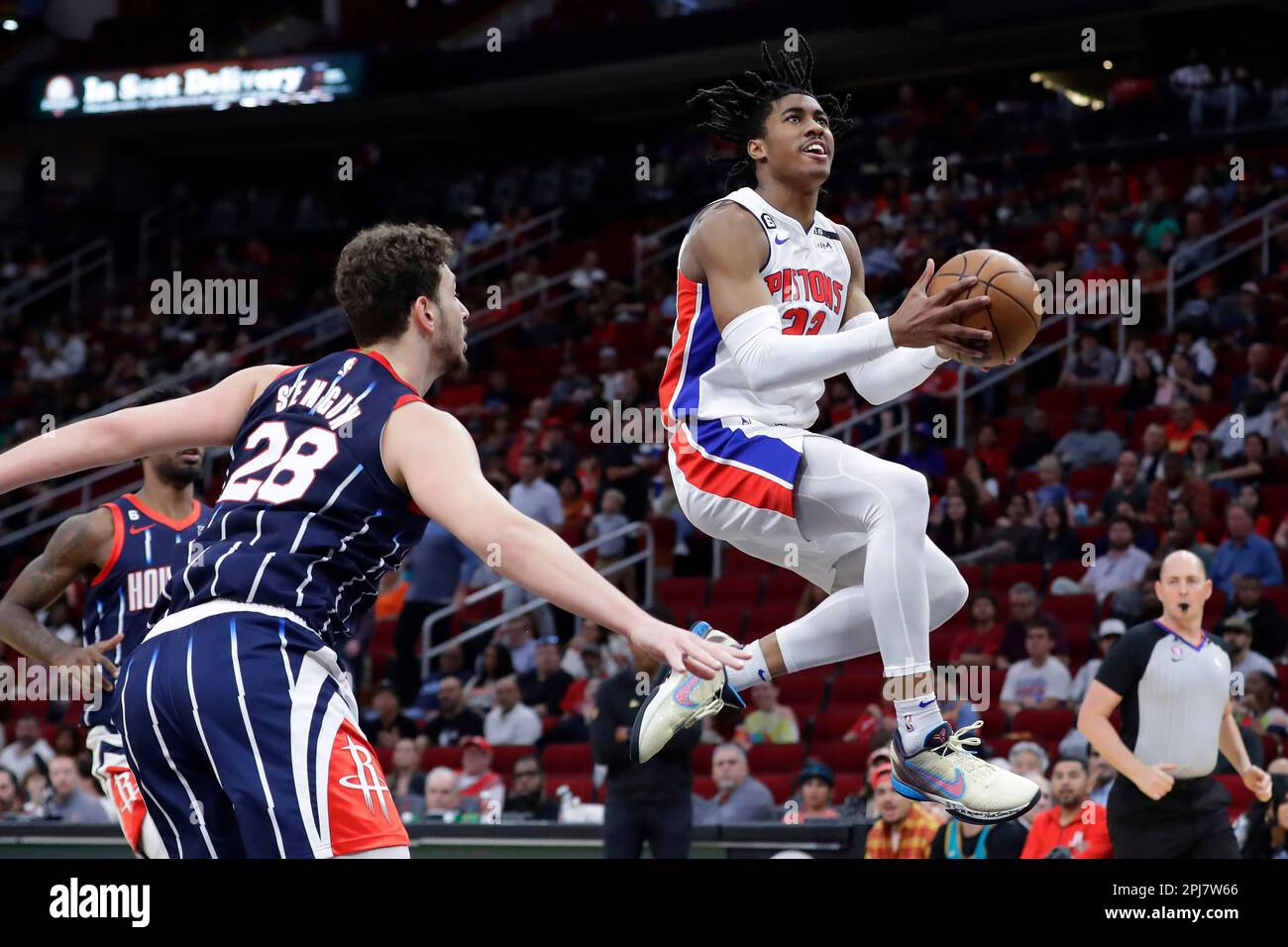 Detroit Pistons guard Jaden Ivey lays up a shot in front of Houston ...