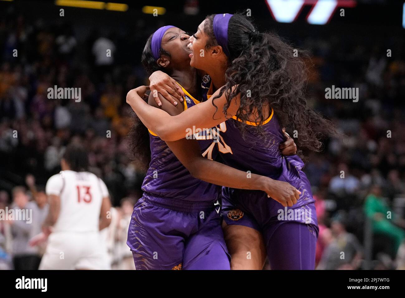 LSU's Flau'jae Johnson and Angel Reese celebrate after an NCAA Women's Final Four semifinals ...