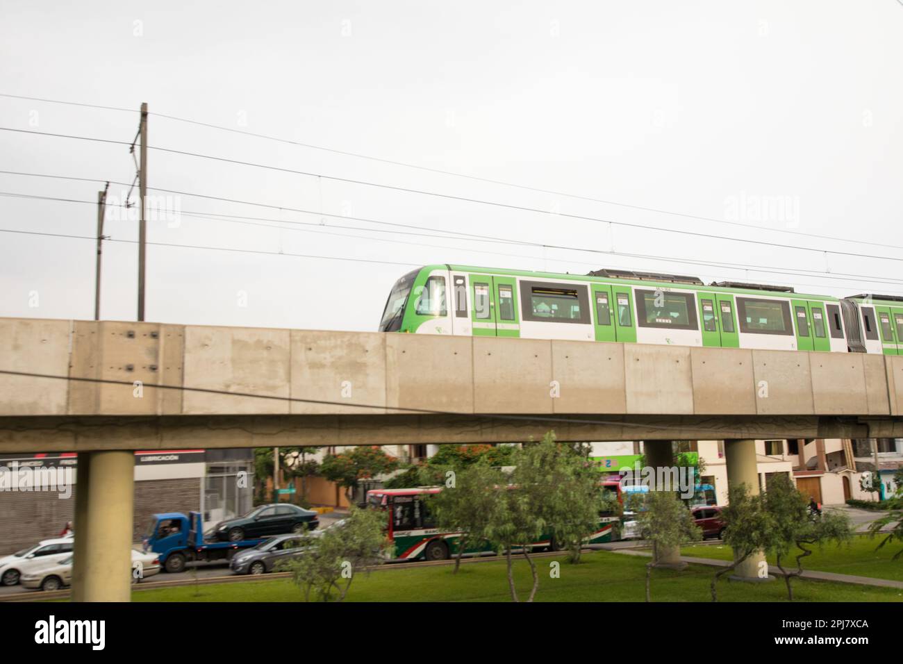 Electrical train going trough Lima Peru Stock Photo - Alamy