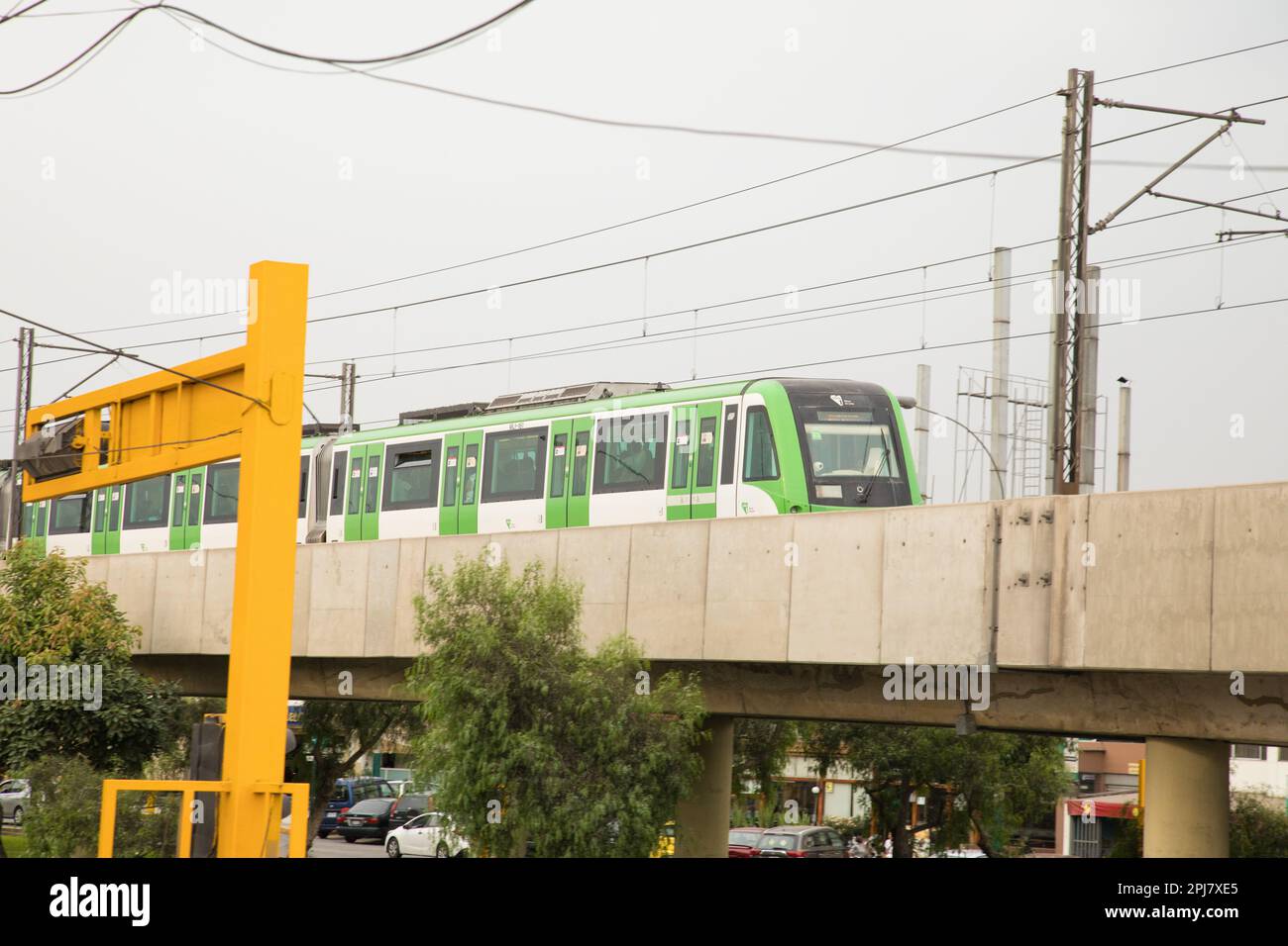 Electrical train going trough Lima Peru Stock Photo - Alamy
