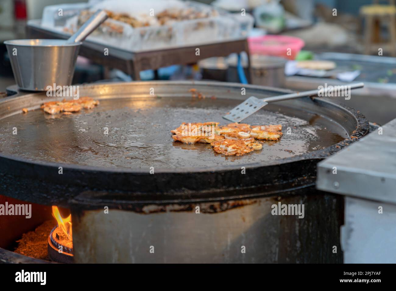 Chef cooking seafood curry hi-res stock photography and images - Alamy