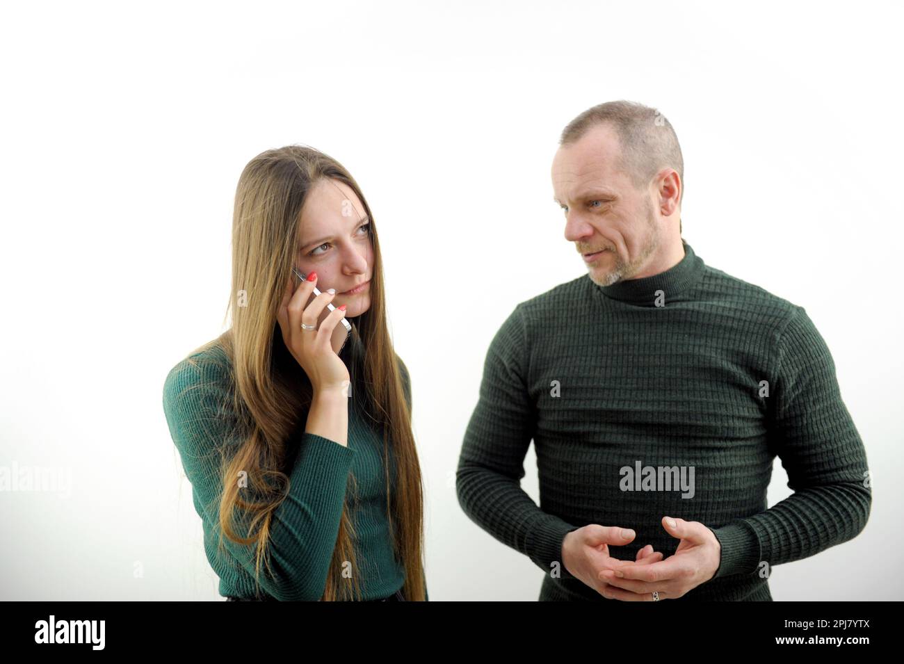 man scolds woman who is talking on phone sort things out troubles ...