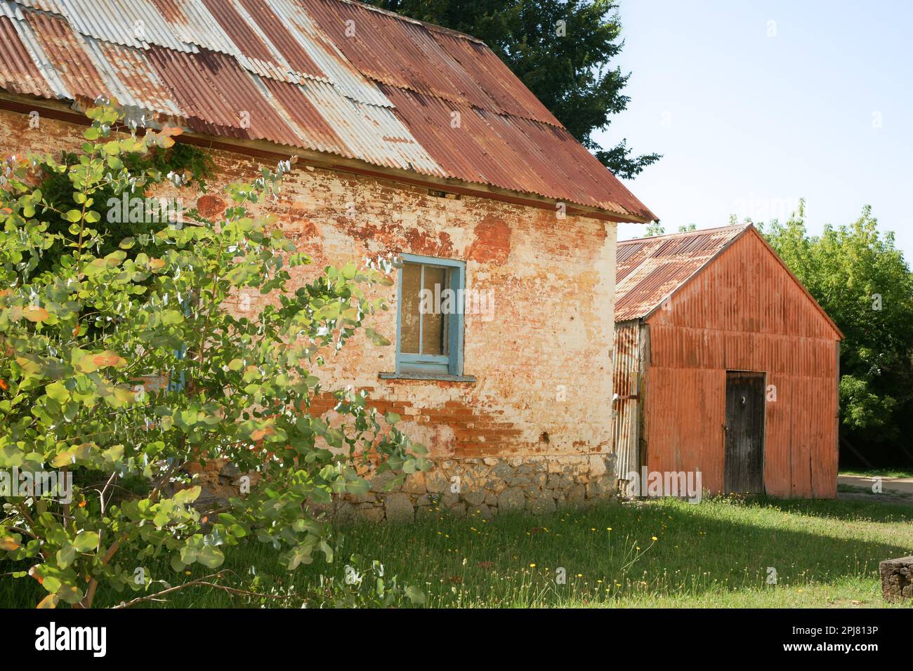 Old buildings brick and rusty corrugated iron in small Australian town ...
