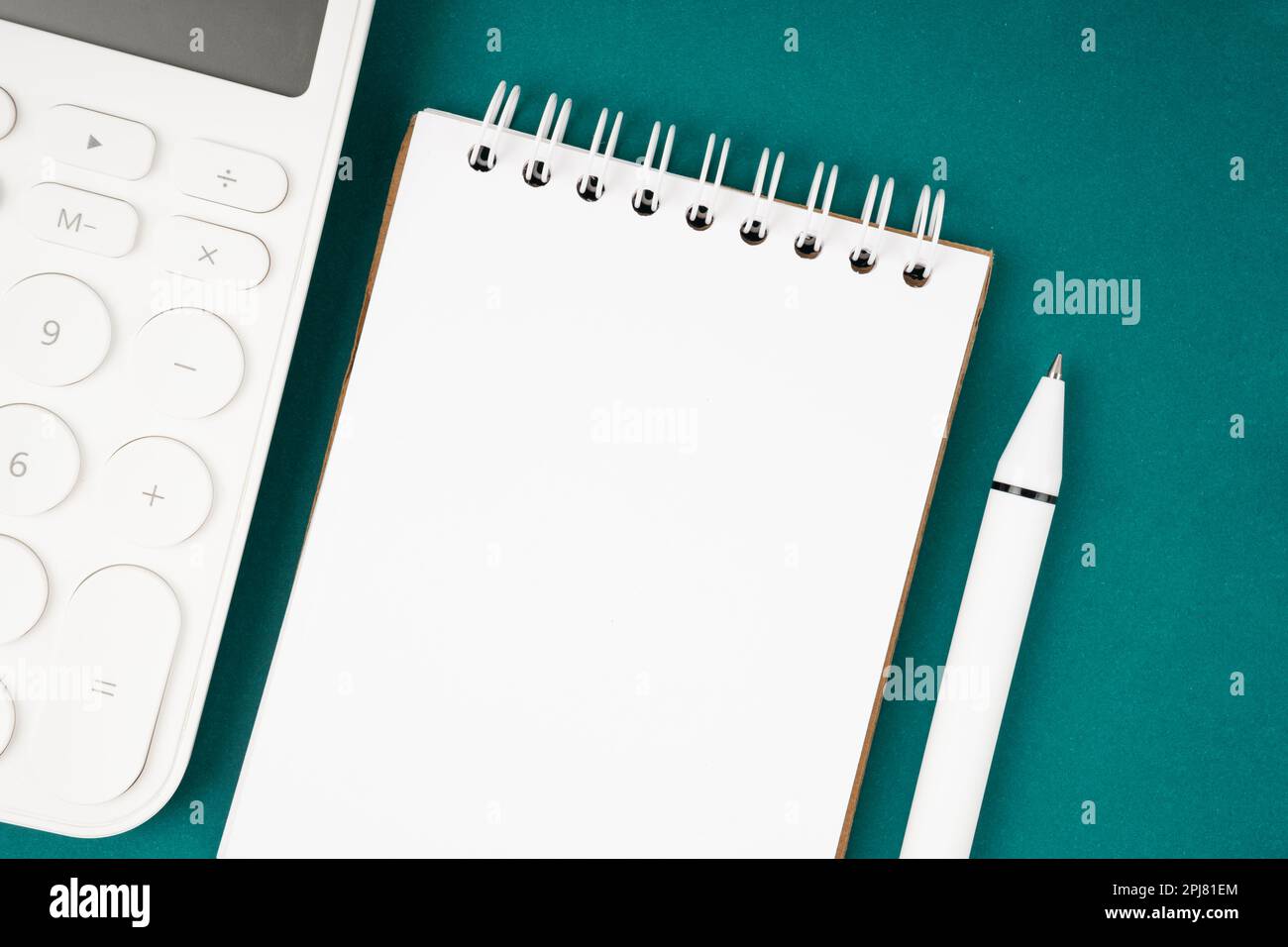 Office calculator book note pad pen hi-res stock photography and images ...
