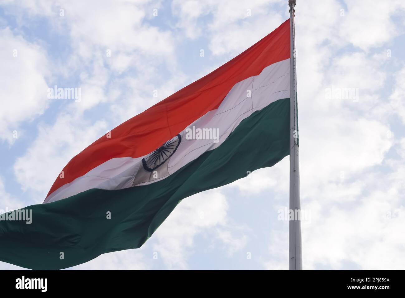 India flag flying high at Connaught Place with pride in blue sky, India ...