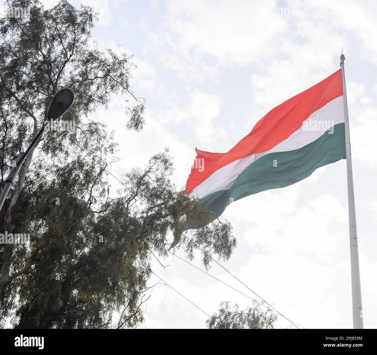 India flag flying high at Connaught Place with pride in blue sky, India ...