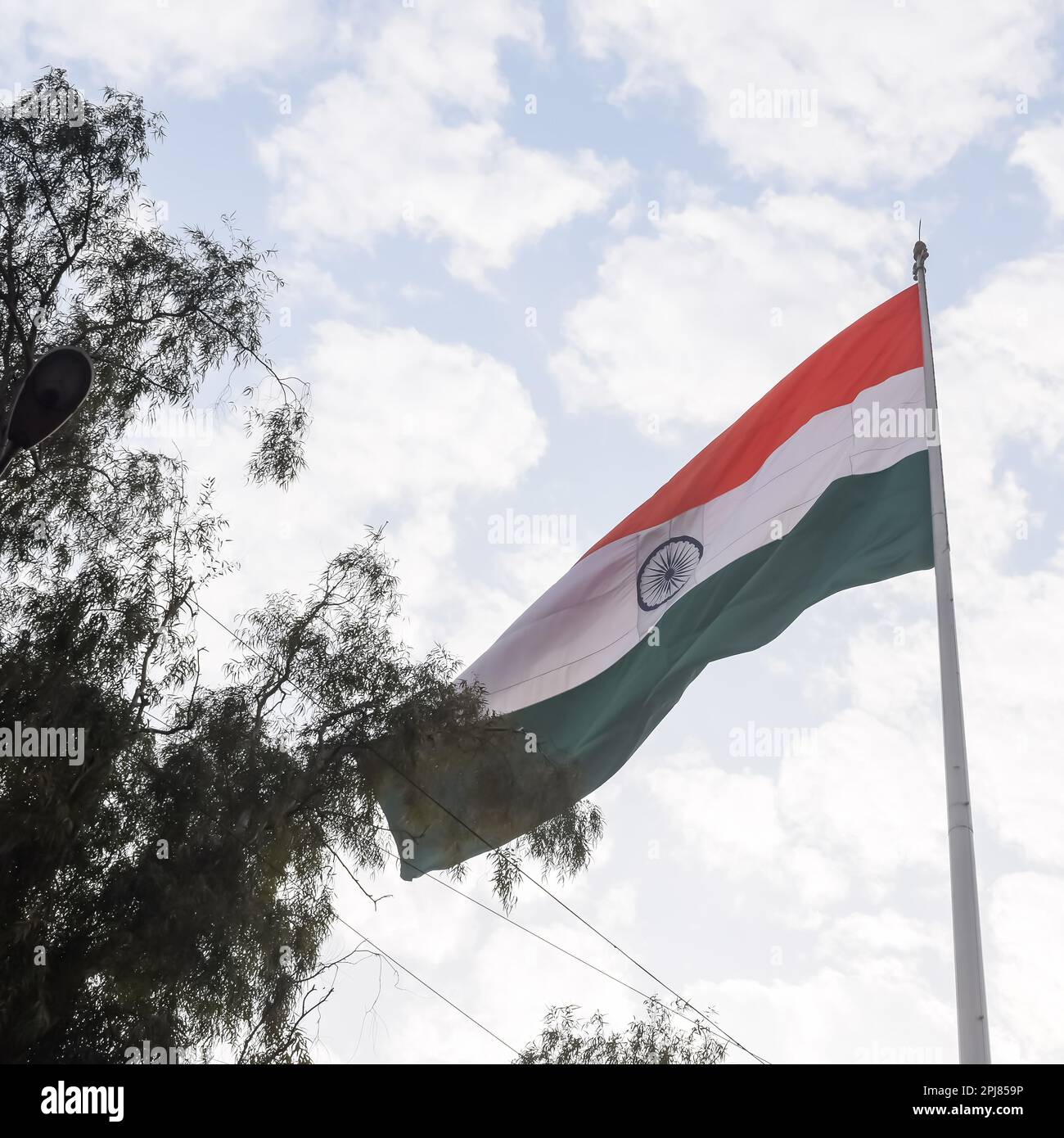 India flag flying high at Connaught Place with pride in blue sky, India ...