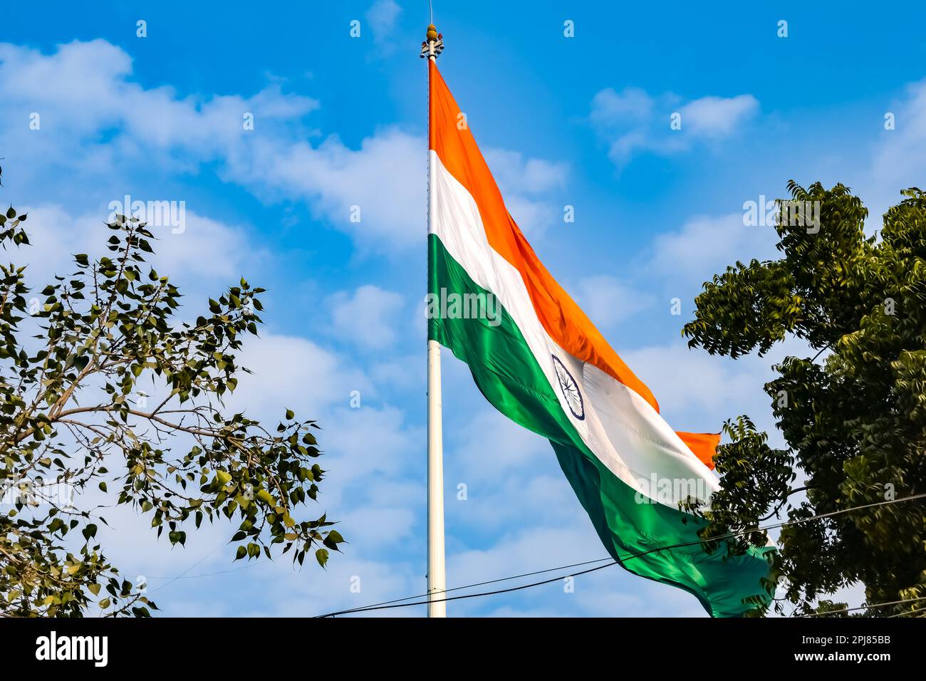 India flag flying high at Connaught Place with pride in blue sky, India ...