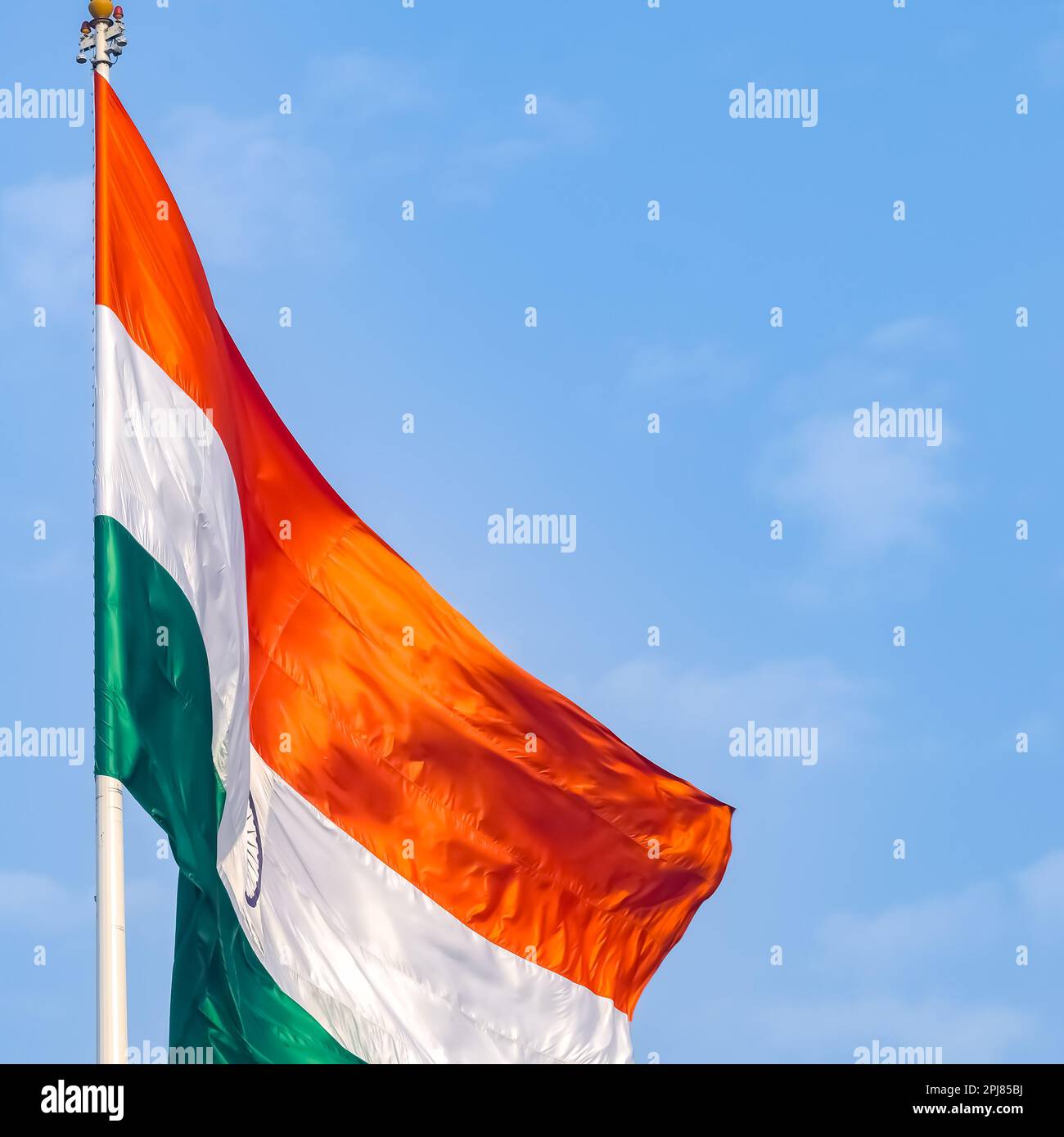 India flag flying high at Connaught Place with pride in blue sky, India ...