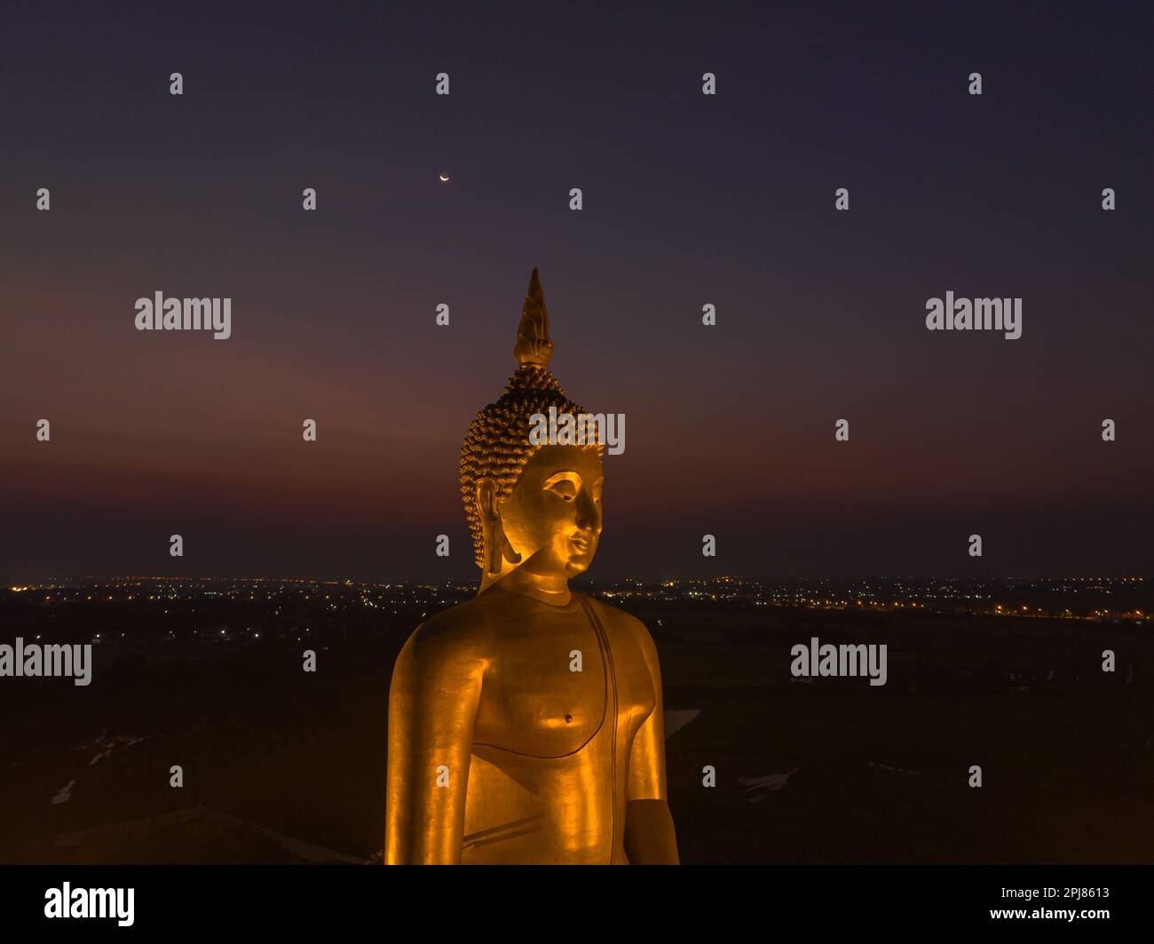 aerial view The moon was above the head of the biggest golden Buddha in ...