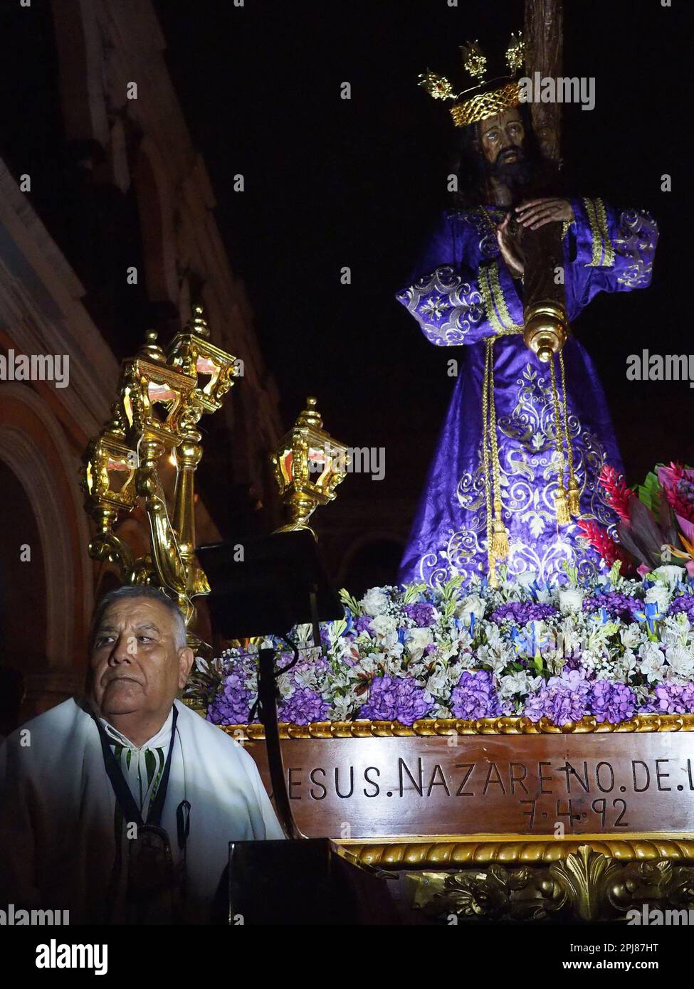 Devotees carrying a religious image leading the Friday of Sorrows ...