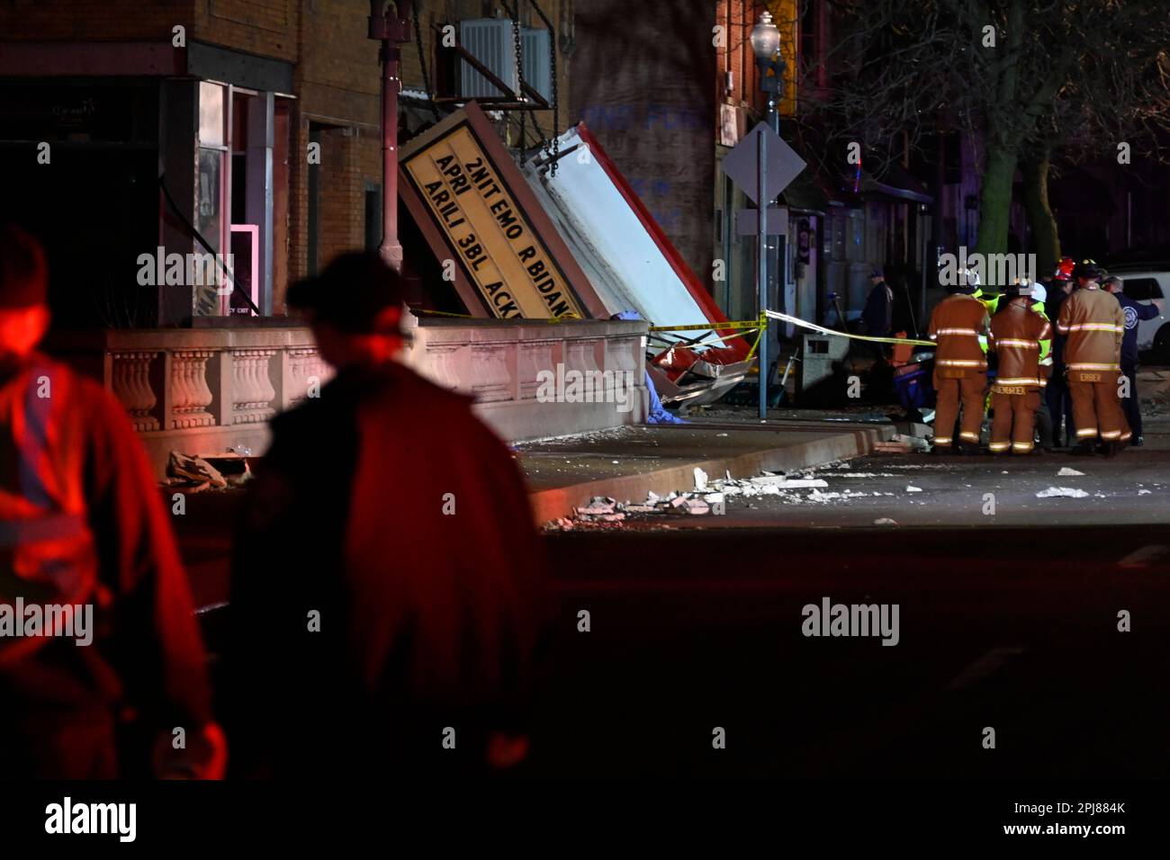 Authorities work the scene at the Apollo Theatre after a severe spring ...