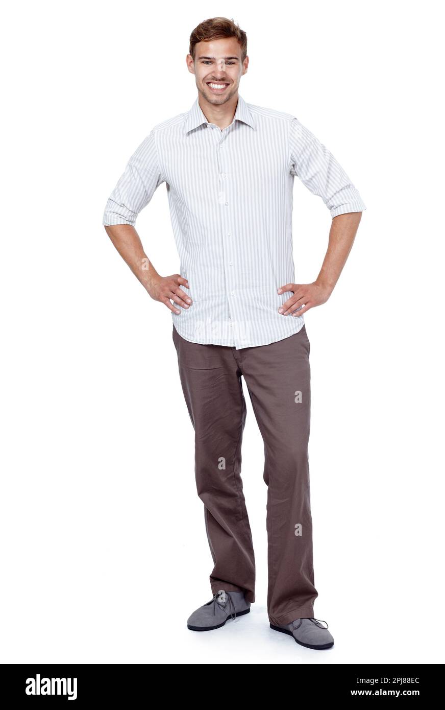 Cool and casual. Full length studio portrait of a handsome young man ...