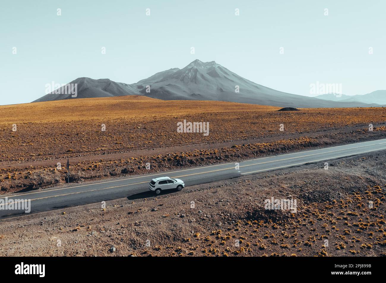 Car in front of Volcanic mountains in San Pedro de Atacama Chile Stock ...