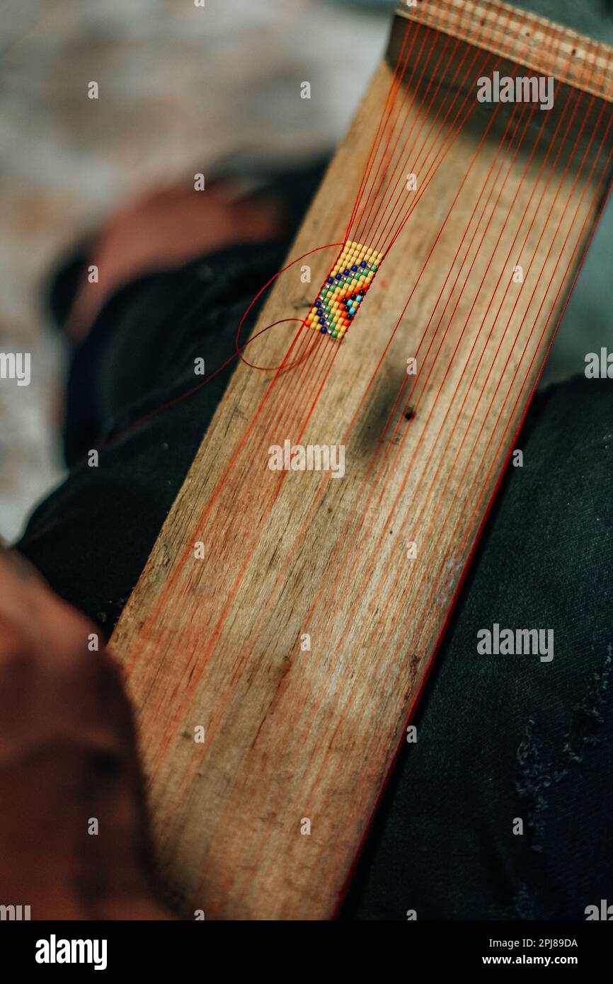 Embera Community of Medellin making Jewelry in Colombia Stock Photo - Alamy